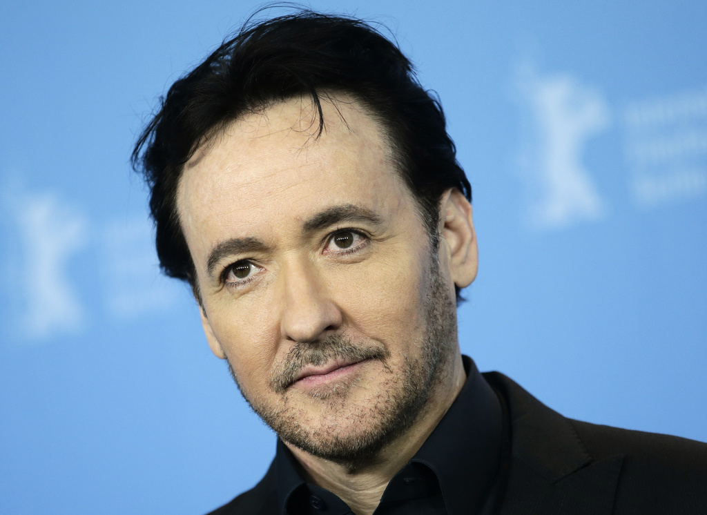 John Cusack attackerad av poliser